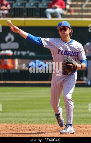 March 29, 2026: Brendan Lawson (11) of Florida holds up his swing while ...