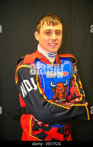 Luke Harris of Buxton Bulls in Red rides outside Jack Roberts of NDL ...