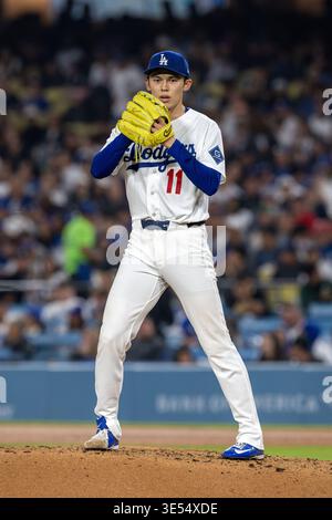 Los Angeles Dodgers' Roki Sasaki throws during the first inning of a ...