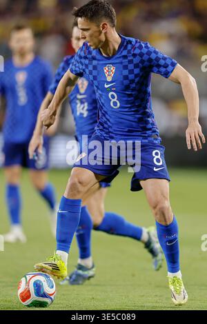 Croatia midfielder Martin Baturina (16) celebrates a goal during the ...