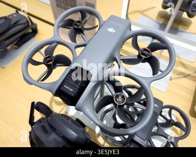 A DJI AVATA 36O, 8K panoramic flagship drone poster displayed in a DJI ...