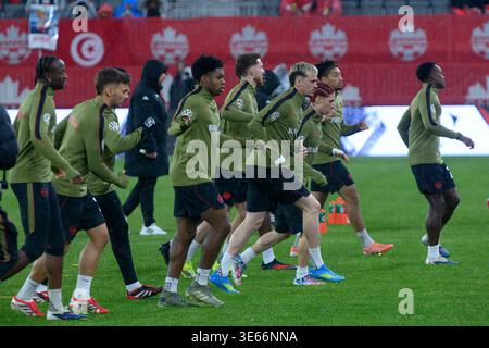 Canada players jog during a FIFA World Cup soccer training session, in ...