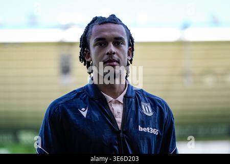Ashley Phillips of Stoke City inspects the pitch prior to kick off ...