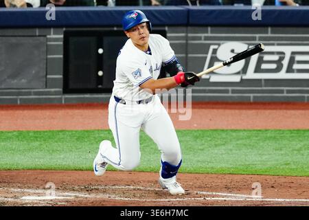 Toronto Blue Jays' Kazuma Okamoto (7) fields a ground ball while ...