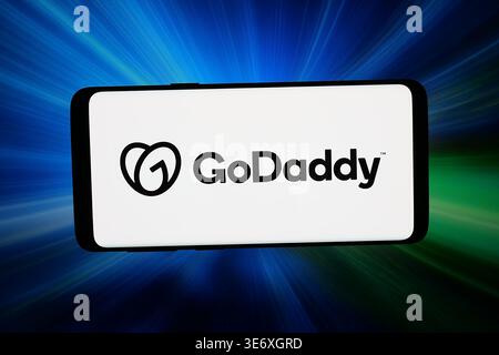 In this photo illustration, the GO Inc logo is seen displayed on a ...