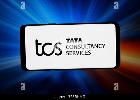 In this photo illustration, the Tata Consultancy Services (TCS) logo is ...