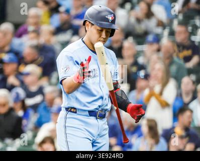 Toronto Blue Jays' Kazuma Okamoto breaks his bat during a baseball game ...
