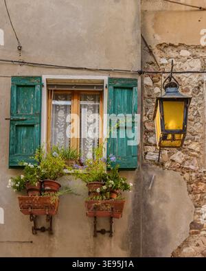 Lantern on the facade of old italian house. Venice, Italy Stock Photo ...