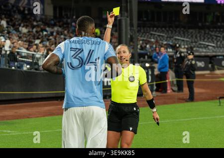 Referee Tori Penso shows yellow card to Raul Gustavo (34) of NYCFC ...