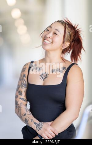 Authentic portrait of a woman displaying casual summer style Stock ...