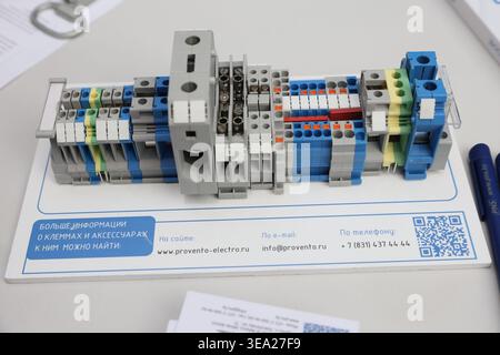 White plastic connectors arranged in circle on wooden surface Stock ...