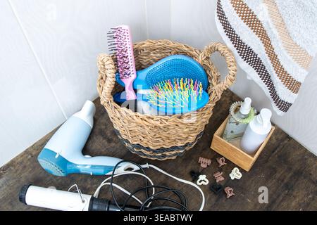Bathroom Counter Organization with Woven Basket. Hairdryer, towel ...