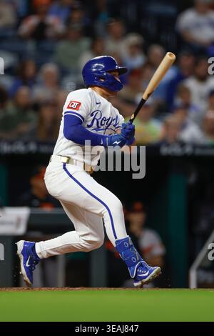 Kansas City Royals' Isaac Collins slides home to score on a sacrifice ...