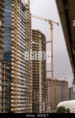 Construction site featuring multiple high-rise buildings under ...