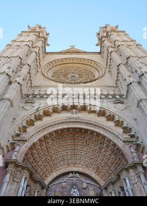 Gothic style church tower against clear blue sky, analog film ...