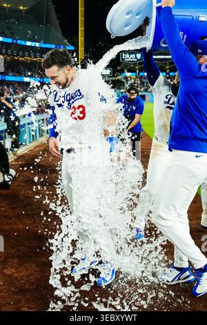 Los Angeles Dodgers' Kyle Tucker (23) greets teammate Andy Pages (44 ...