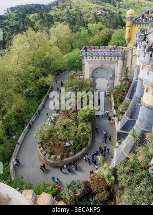 High-angle view of visitors walking in the outdoor courtyard of Technik ...