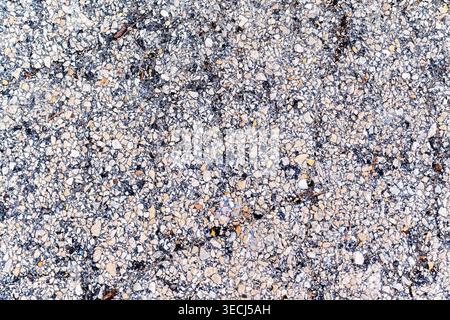 Texture of fragment of gray path made of masonry with sand in seams ...