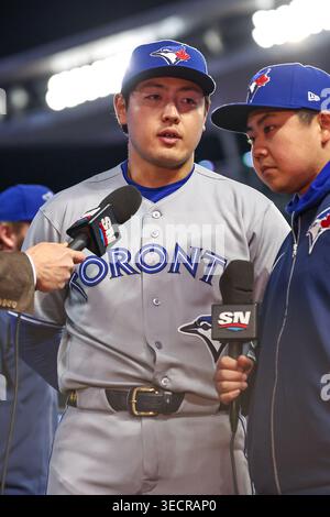 Toronto Blue Jays' Kazuma Okamoto hits a two-run home run during the ...