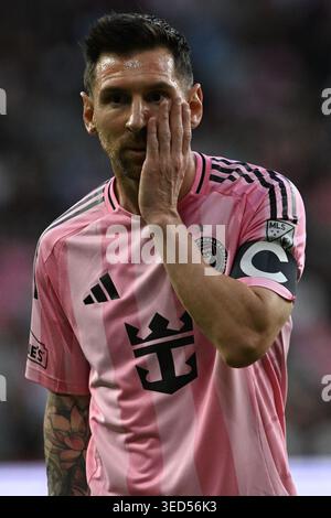 Inter Miami forward Lionel Messi (10) drives downfield under pressure ...