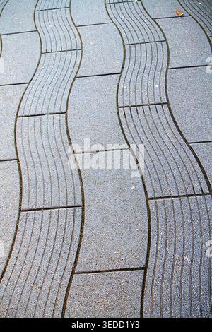 Abstract architectural background featuring curved wavy wooden panels ...