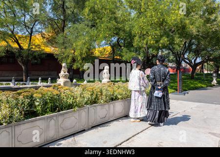Tourists visit the Forbidden City under blue skies in Beijing, China ...