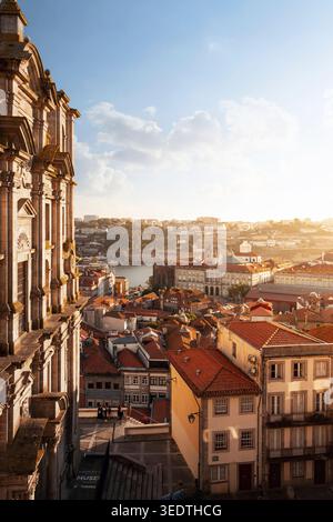 Porto old town with terracotta roofs, historic buildings, and boats on ...