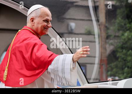 Pope Leo XIV seen greeting a child as he arrives for his weekly general ...