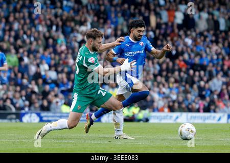 Nicholas Tsaroulla of Notts County fouls Rosaire Longelo of Salford ...