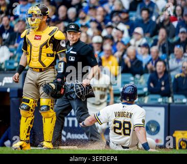 Milwaukee Brewers first baseman Andrew Vaughn (28) forces out Cleveland ...