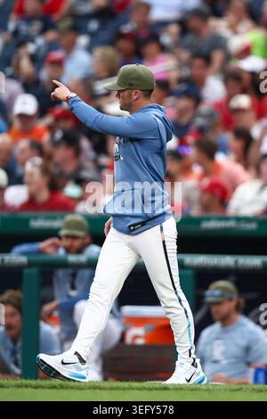 Washington Nationals manager Blake Butera, right, makes a line up ...