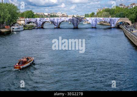 As a tribute to Christo and his wrapping of the Pont Neuf, artist JR ...