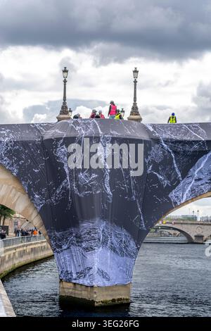 As a tribute to Christo and his wrapping of the Pont Neuf, artist JR ...