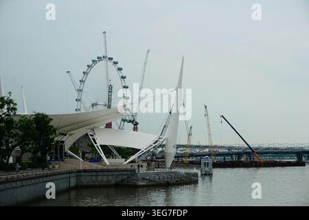 Singapore, Central Region: The Helix Bridge nearby Marina Bay with ...