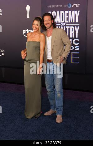 Haley Hubbard and Tyler Hubbard attend the 61st Academy of Country ...