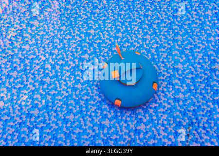 Robotic vacuum float activity in clear water of swimming pool ...