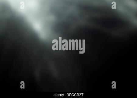 A dark, moody abstract background with diagonal stripes and vertical ...