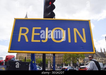 A 'Rejoin' sign is displayed during the weekly anti-Brexit and pro-EU ...