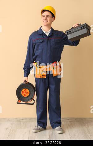 Male technician with bag of tools near air conditioner in room Stock ...