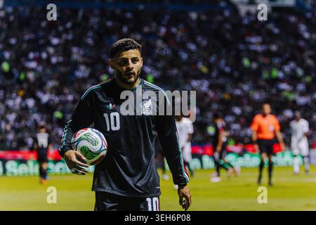 Fans of the Mexican national soccer team wave the Mexican flag while ...
