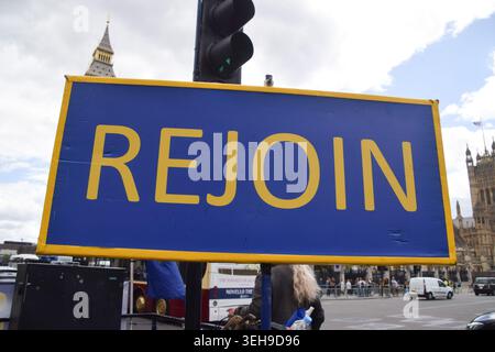 A 'Rejoin' sign is displayed during the weekly anti-Brexit and pro-EU ...
