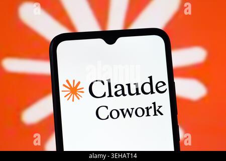 In this photo illustration, a Claude Cowork logo is seen on a ...