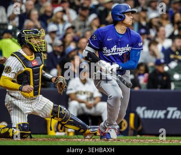 Milwaukee Brewers' Gary Sánchez hits an RBI single during the second ...
