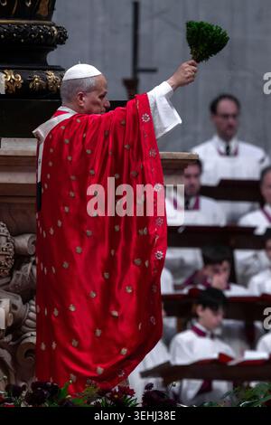 Pope Leo XIV gives his blessing during a Mass for the Solemnity of ...