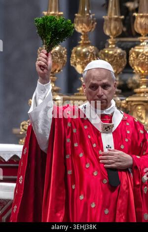 Pope Leo XIV gives his blessing during a Mass for the Solemnity of ...