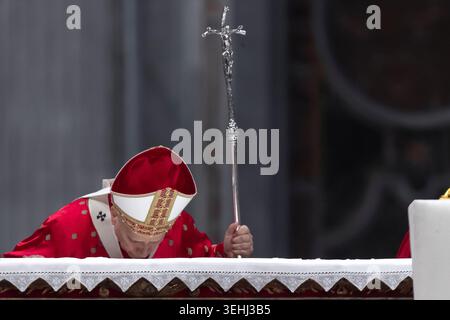 Pope Leo XIV Kisses the altar at the end of a Mass for the Solemnity of ...