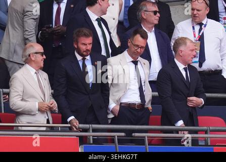 Salford City co-owner Sir David Beckham (second left) and Paul Scholes ...