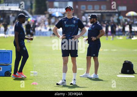 Canterbury, England. 25th May 2026. Tom Clark raises his bat after ...