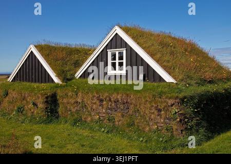 Traditional wooden shower with grass roof, Museum Hellissandur ...