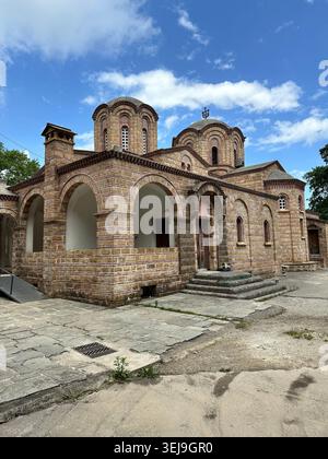 A historic Greek Orthodox monastery complex sits majestically on a ...